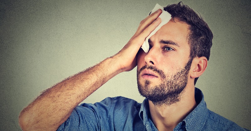 What causes sweating on the face?